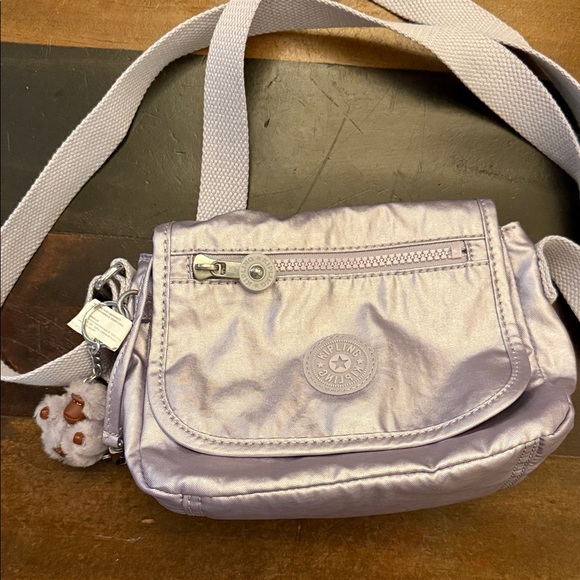 Kipling | Bags | Kipling Metallic Lilac Crossbody Bag | Poshmark